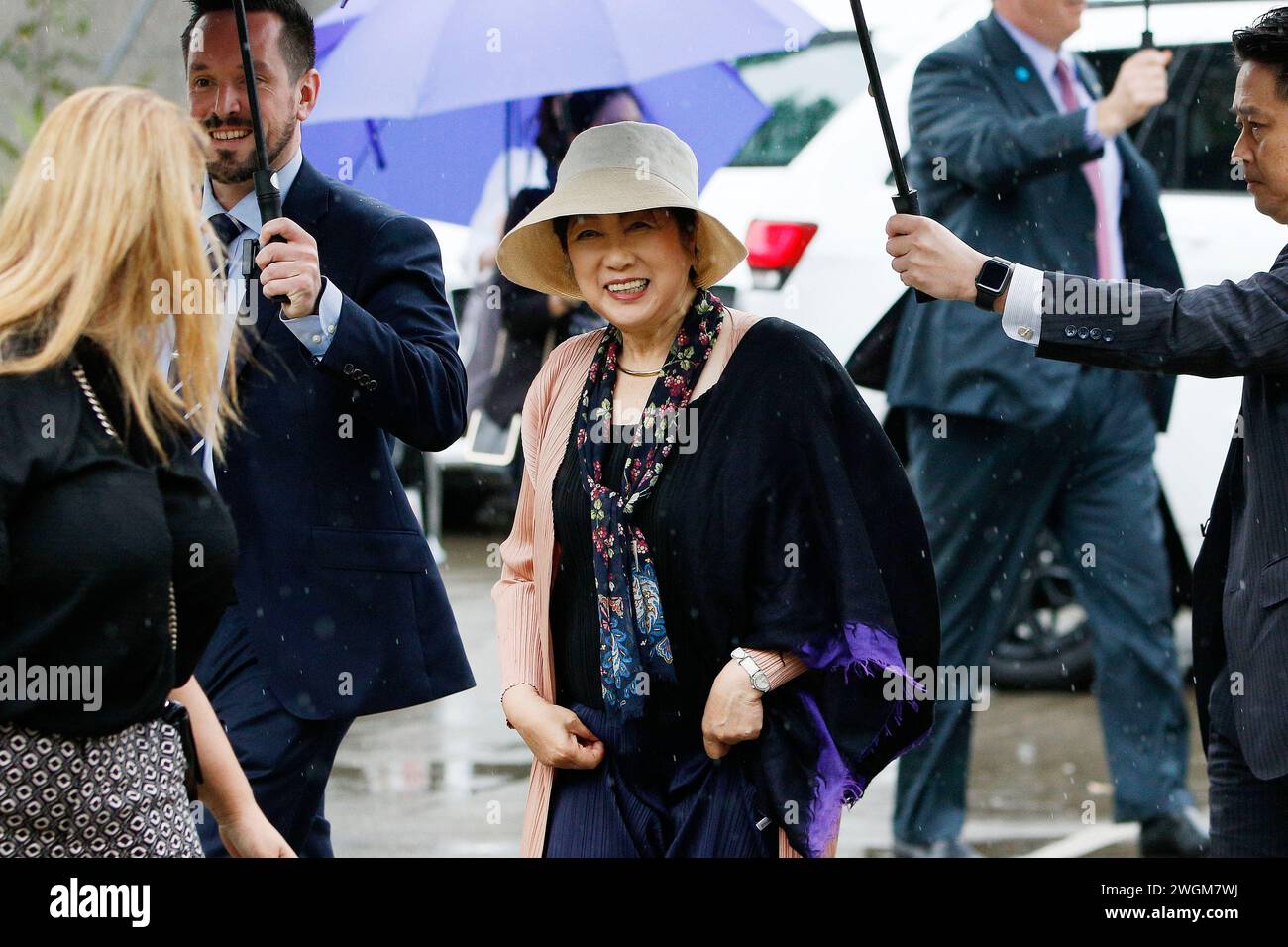 Tokyo Gov. Yuriko Koike, center, arrives for her helicopter tour of the ...
