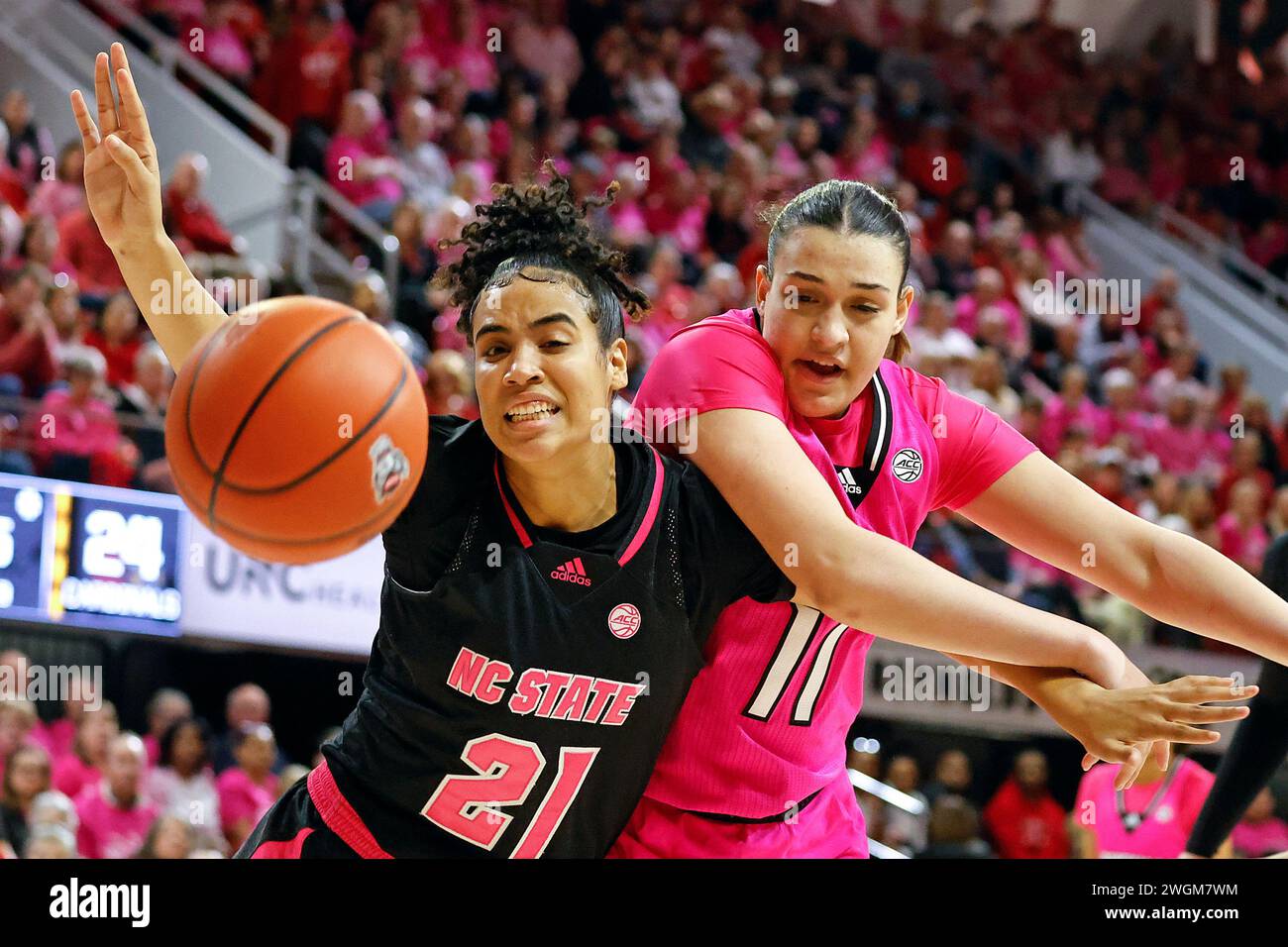 North Carolina State's Madison Hayes (21) battles for the ball with ...
