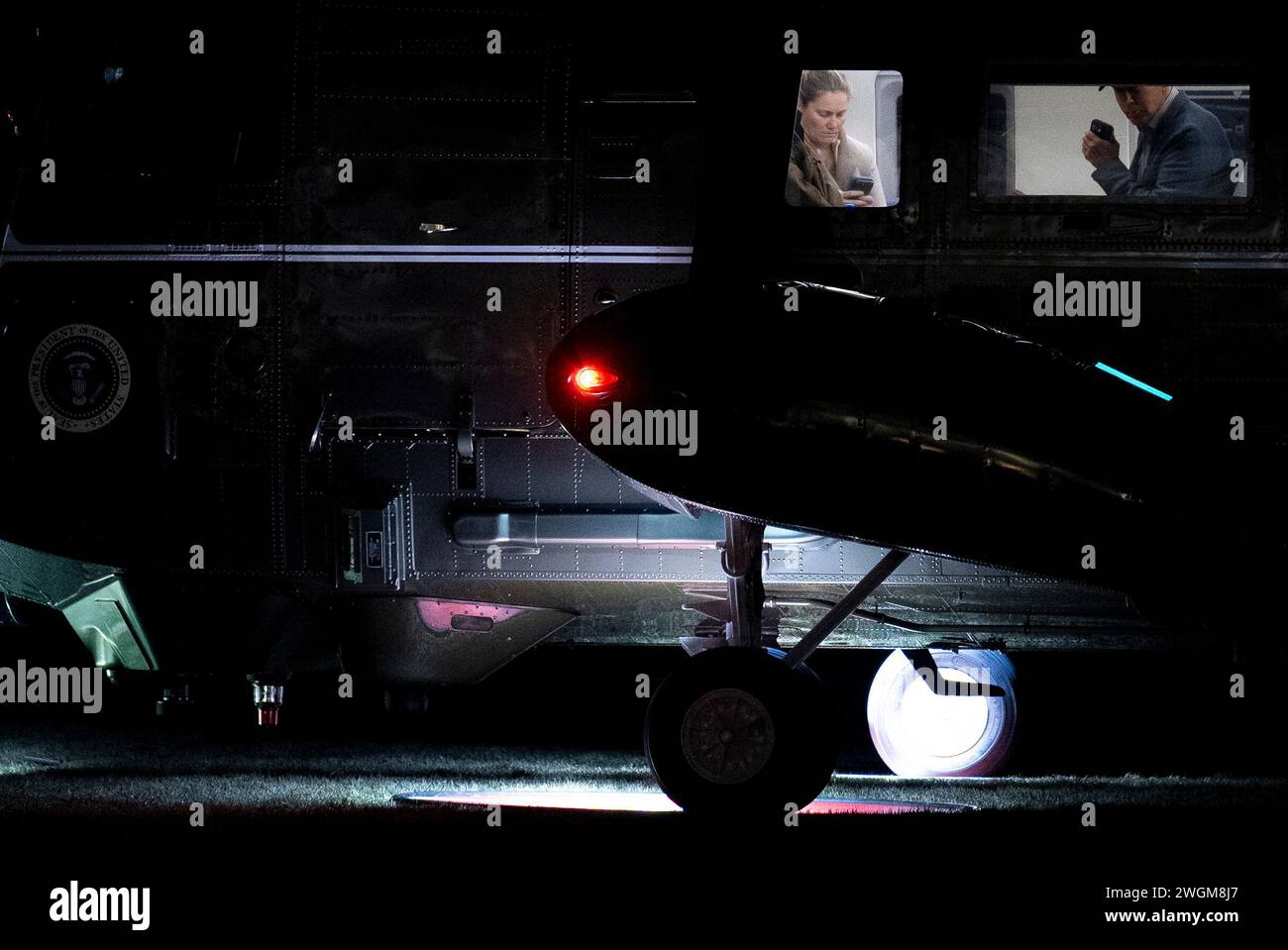 President Joe Biden, right, accompanied by Annie Tomasini, Assistant to ...