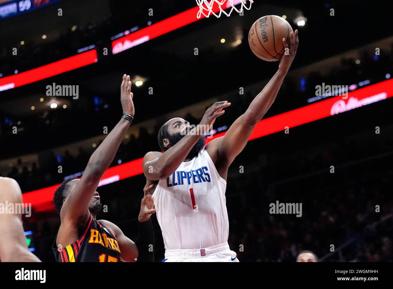 LA Clippers guard James Harden (1) scores as Atlanta Hawks forward ...