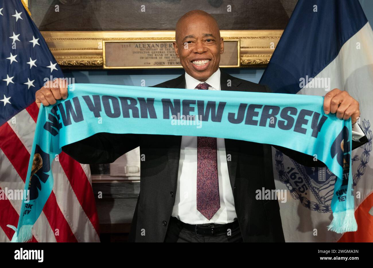 New York, USA. 05th Feb, 2024. Mayor Eric Adams holds bar scarf ...