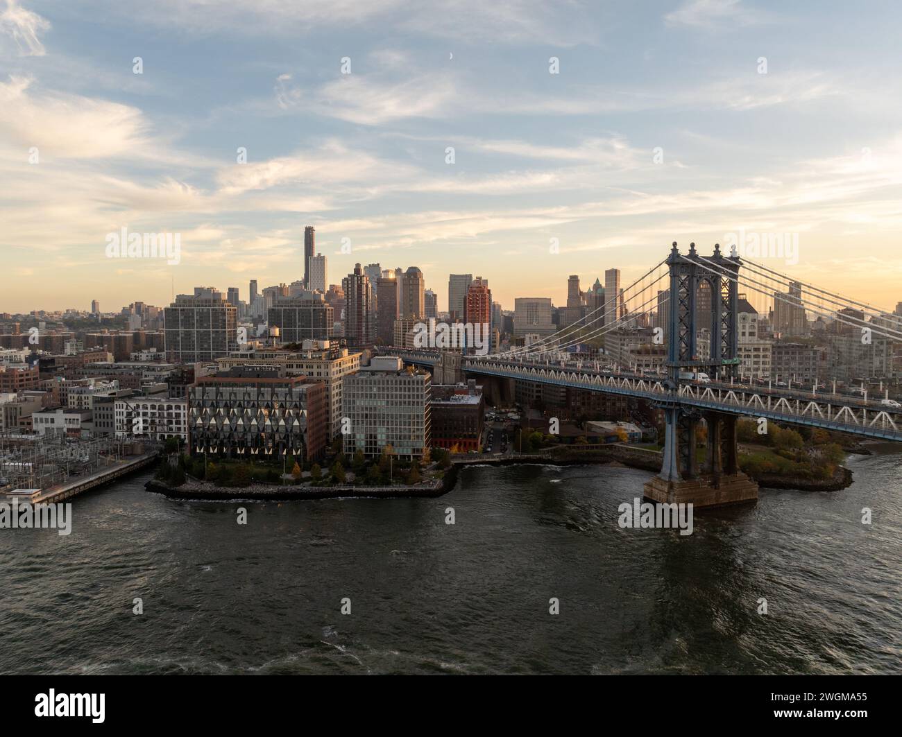 Aerial view of the Manhattan Bridge spanning the East River with the ...