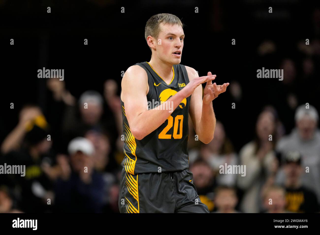 Iowa forward Payton Sandfort (20) reacts during the second half of an ...