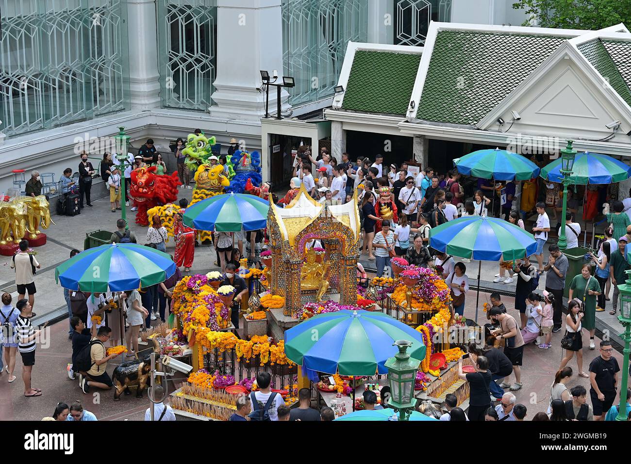 Erawan shrine with lion dance troupe, a popular tourist destination in ...