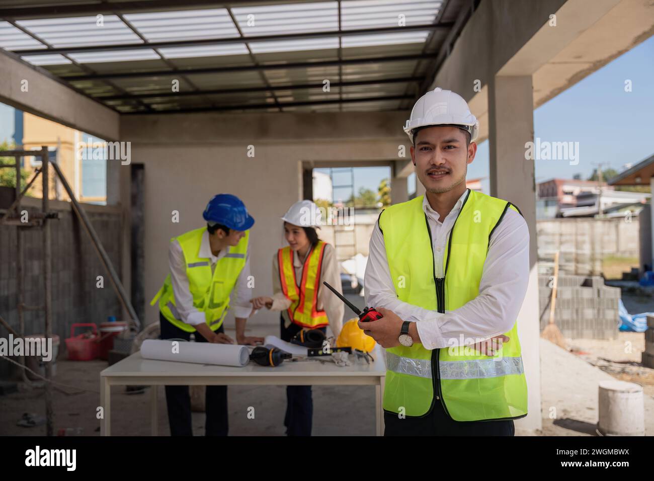 Happy of team construction worker. engineer, construction site and team ...