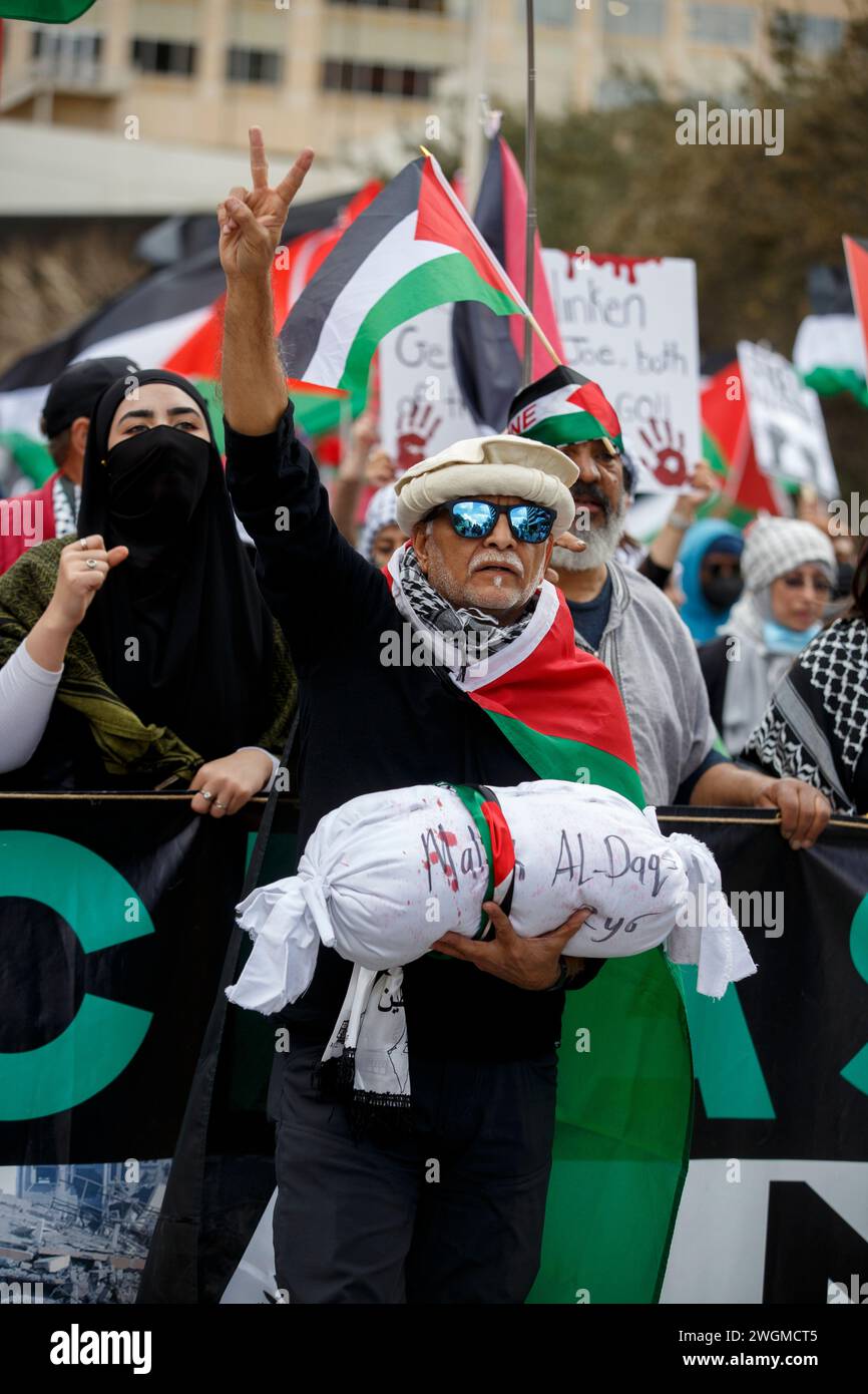 Austin, Texas, USA. 5th Feb, 2024. A man carries a mock baby corpse ...
