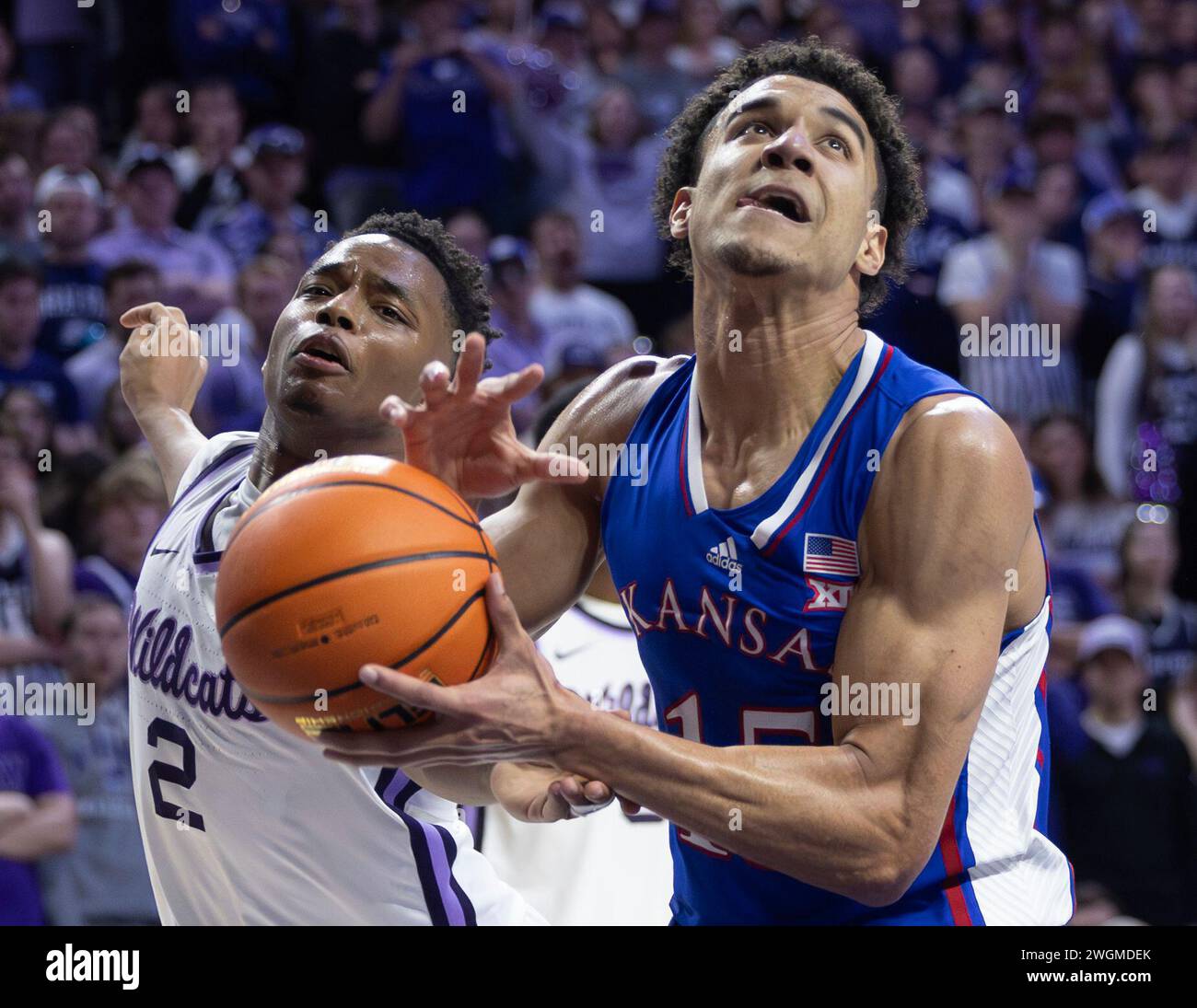 Kansas' Kevin McCullar Jr., right, has the ball stripped away by Kansas ...