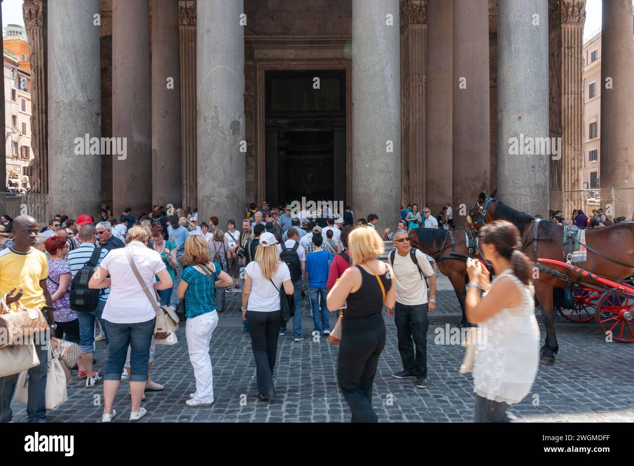 Rome Italy - May 19 2011; Tourists in street crowd around entrance to ...