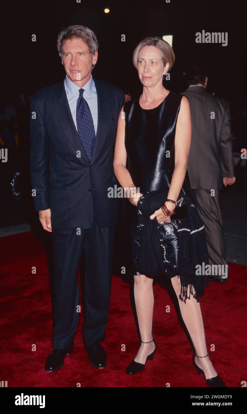Harrison Ford and wife Melissa Mathison attend the premiere of "Random ...