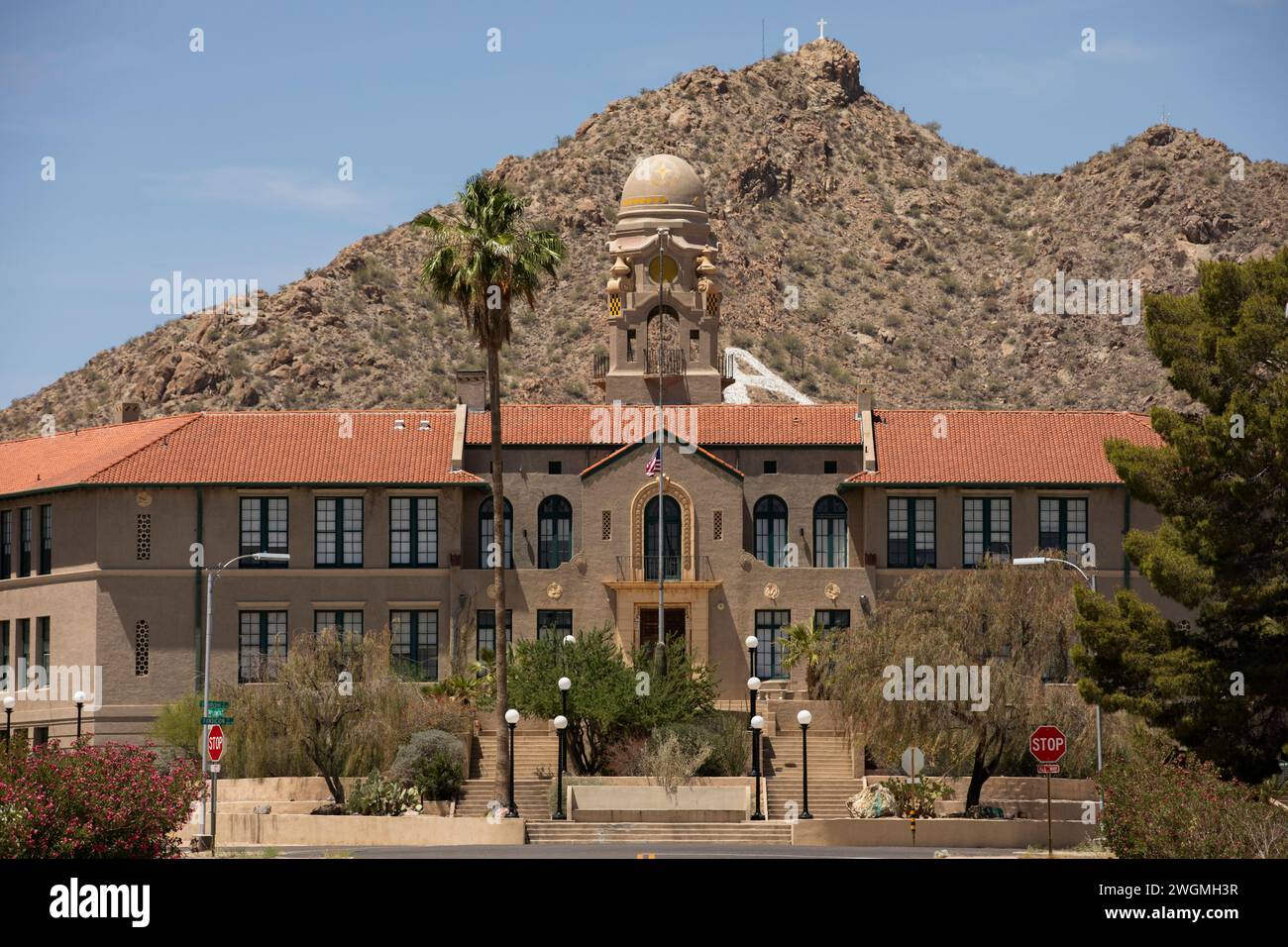 Palm framed daytime view of historic buildings in downtown Ajo, Arizona ...