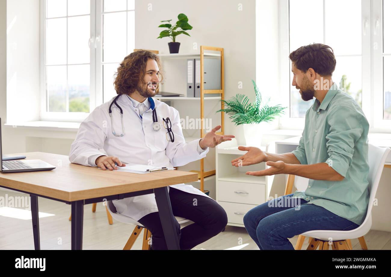 Doctor advises patient on treatment hi-res stock photography and images ...