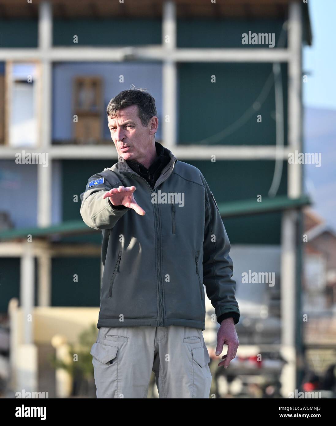 Pristina, Kosovo. 05th Feb, 2024. Director John Doone explains the ...