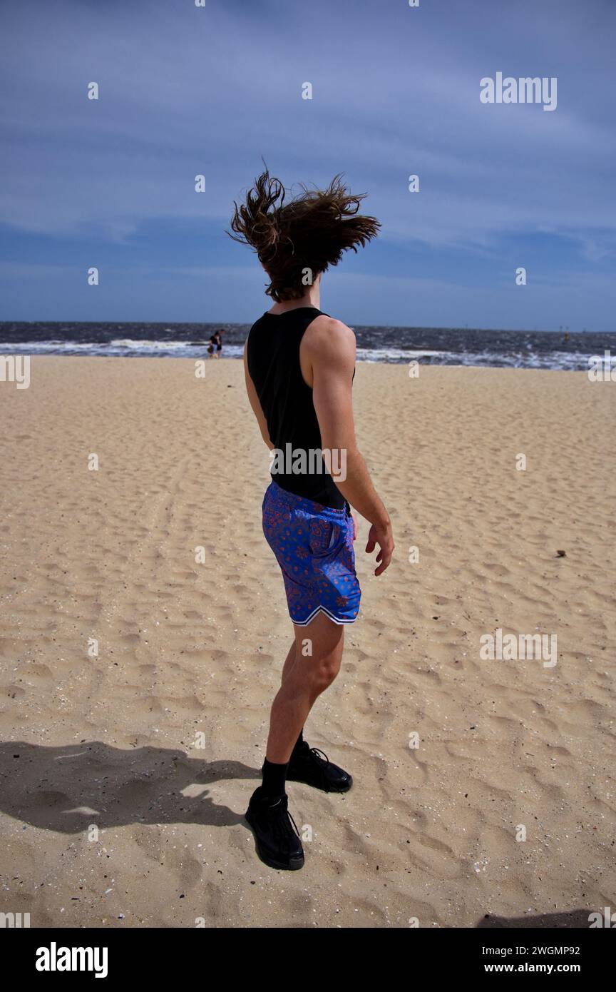 People standing sandy beach beach hi-res stock photography and images ...