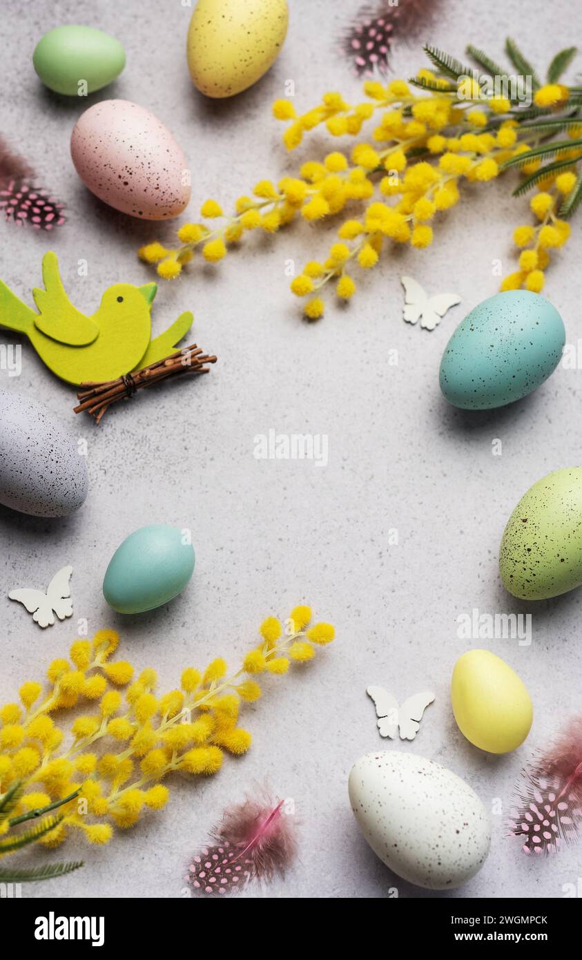 Decorative Easter composition featuring pastel-colored eggs, vibrant ...