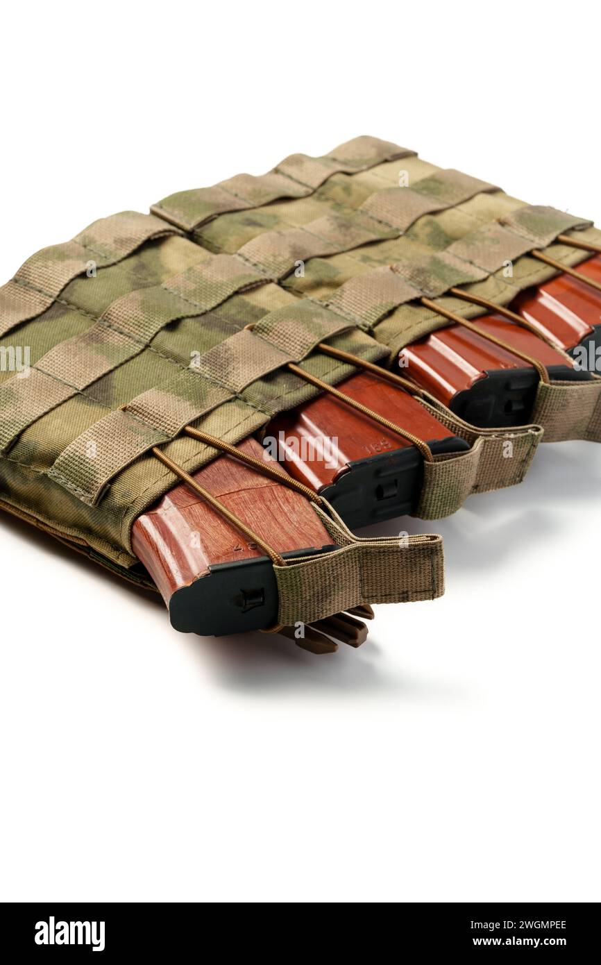 Military pouch with bullet magazines inside isolated on white ...