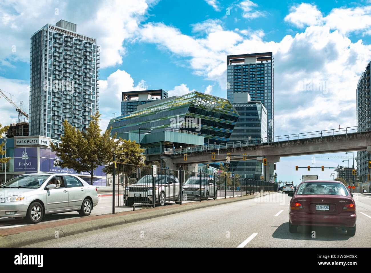 Street traffic. Rush hour at Surrey Vancouver downtown area. Busy Urban ...