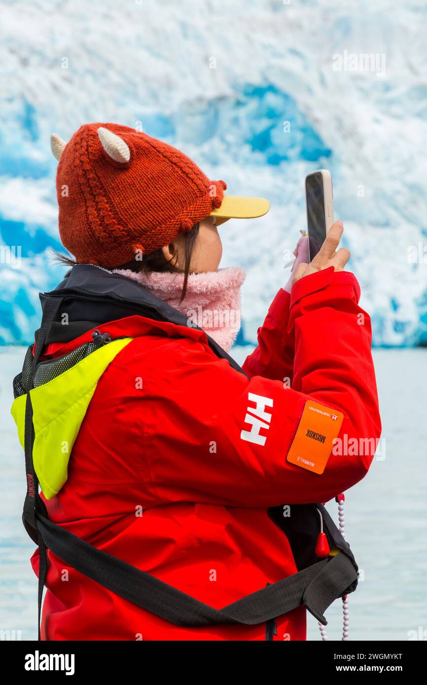 Close up of tourist taking a photo on mobile phone smartphone of ...