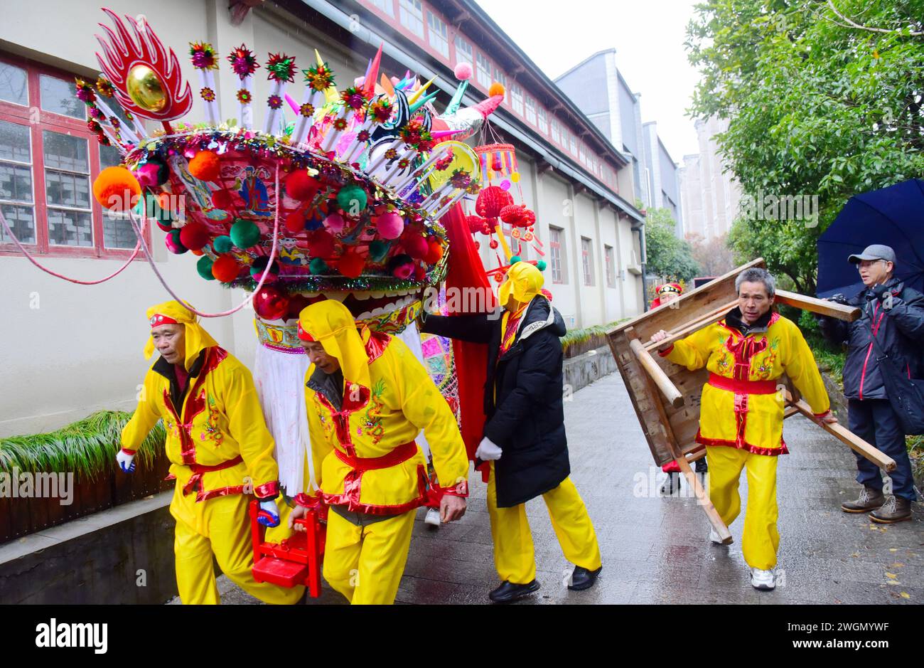 People take part in a folk parade to welcome the Spring Festival in ...