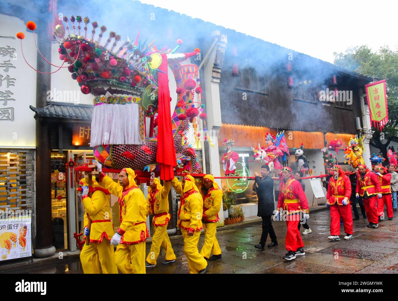 People take part in a folk parade to welcome the Spring Festival in ...