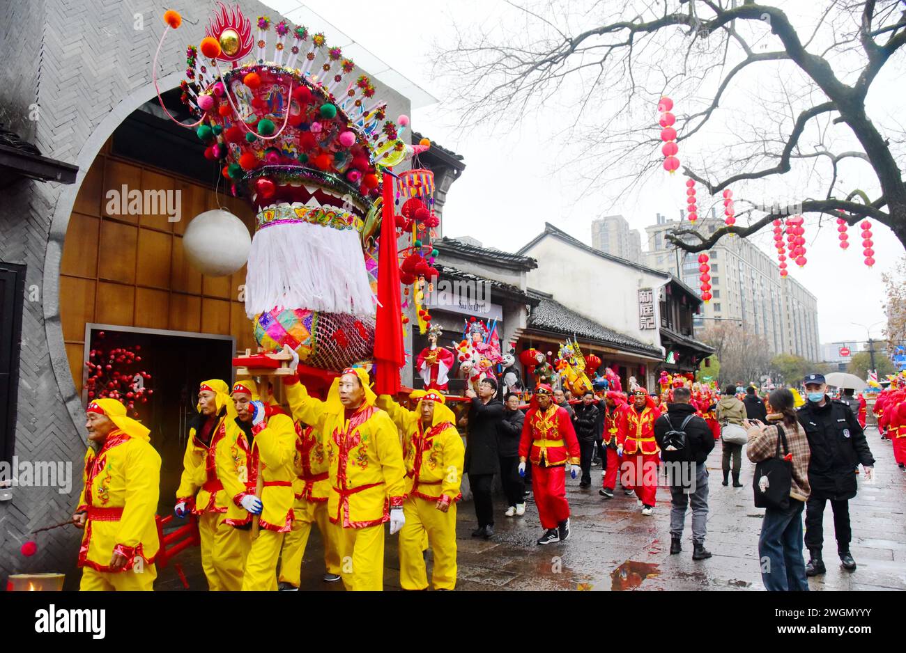 People take part in a folk parade to welcome the Spring Festival in ...