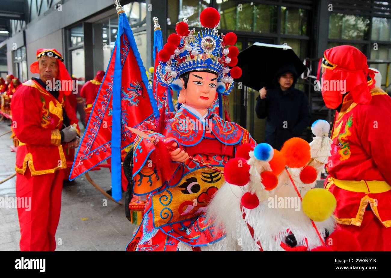 People take part in a folk parade to welcome the Spring Festival in ...