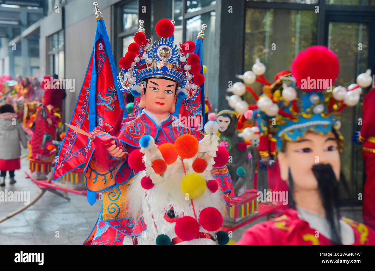 People take part in a folk parade to welcome the Spring Festival in ...