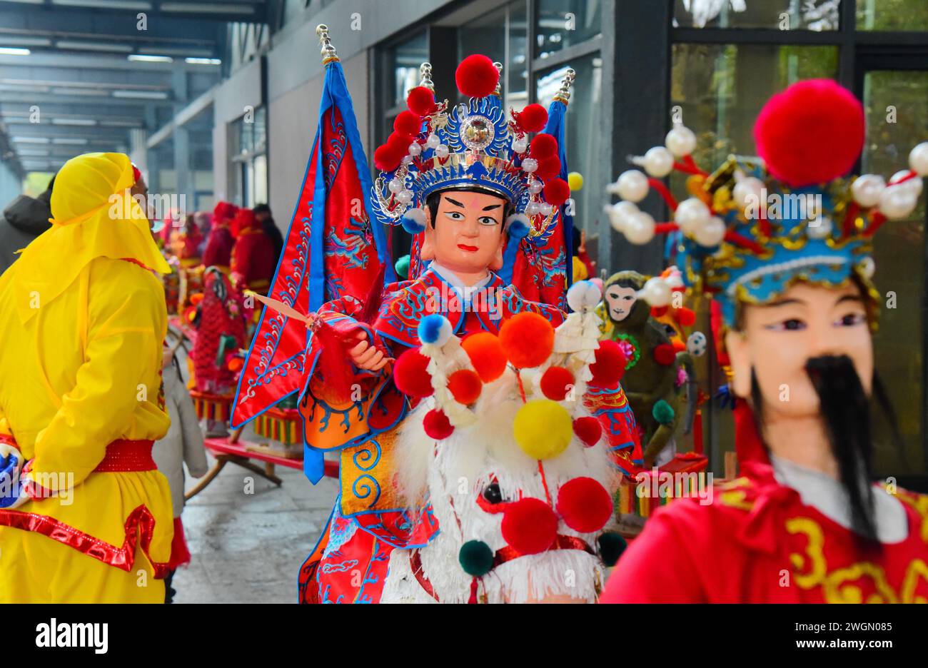 People take part in a folk parade to welcome the Spring Festival in ...