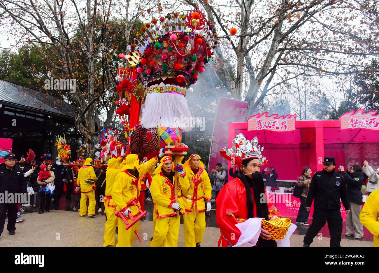 People take part in a folk parade to welcome the Spring Festival in ...