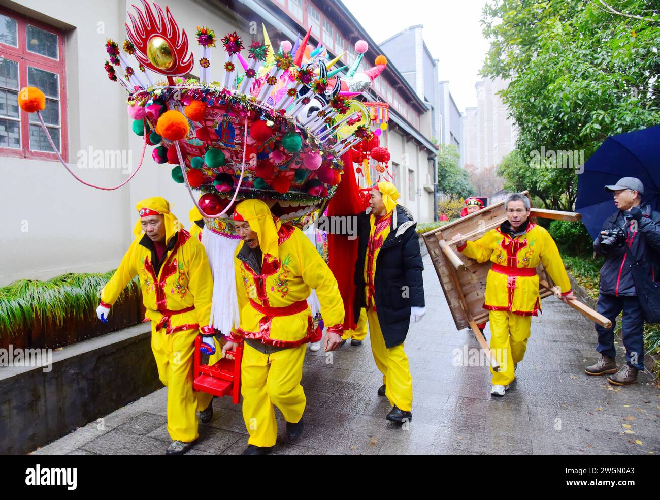 People take part in a folk parade to welcome the Spring Festival in ...