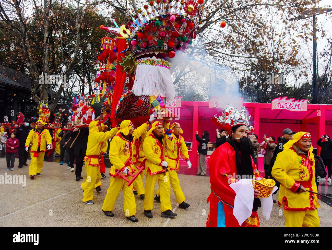 People take part in a folk parade to welcome the Spring Festival in ...
