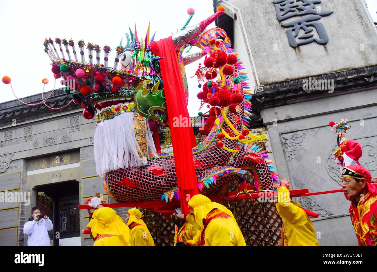 People take part in a folk parade to welcome the Spring Festival in ...