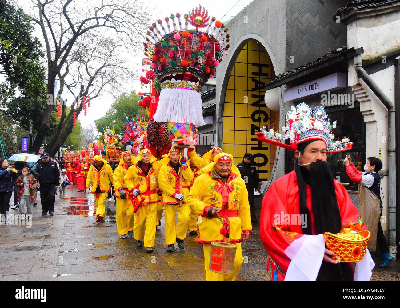 People take part in a folk parade to welcome the Spring Festival in ...