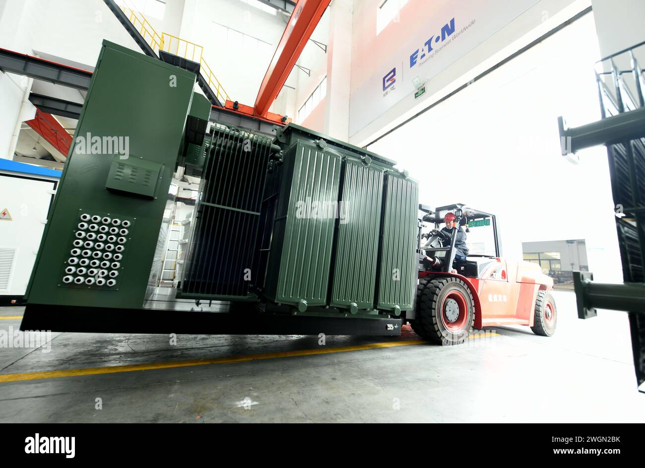 HAIAN, CHINA - FEBRUARY 6, 2024 - Workers load 25 energy-saving ...