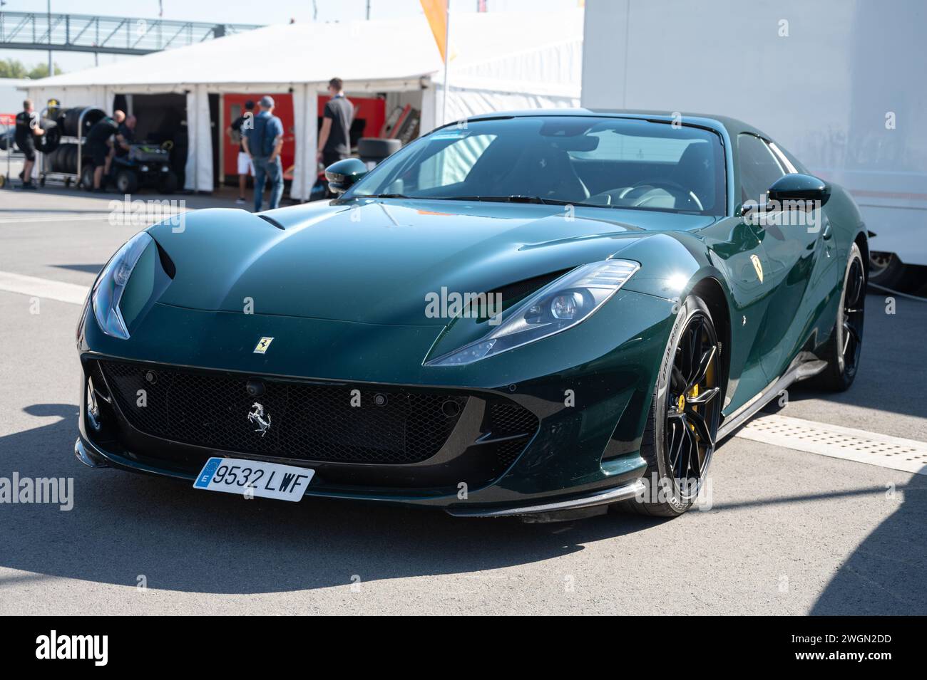 Front view of the modern and stunning and elegant dark green Ferrari ...