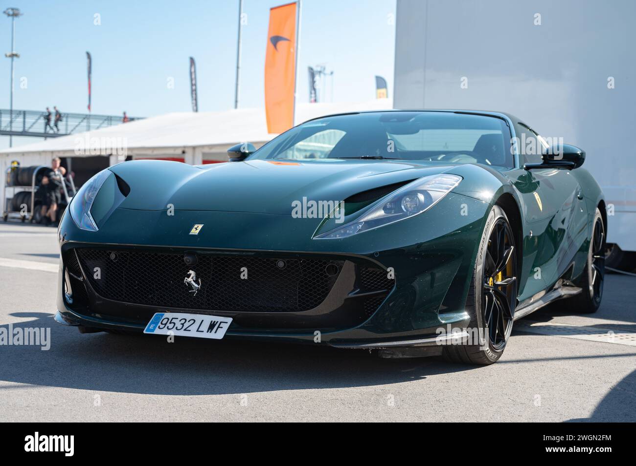 Front view of the modern and stunning and elegant dark green Ferrari ...