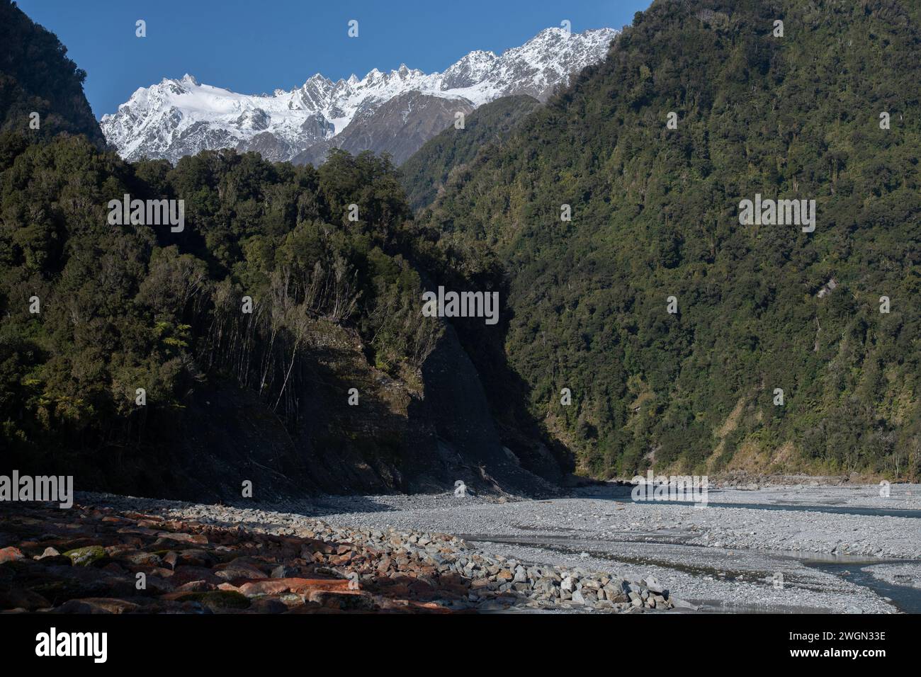 Snow-capped mountains, Waihou River and flood plain by Franz Josef ...