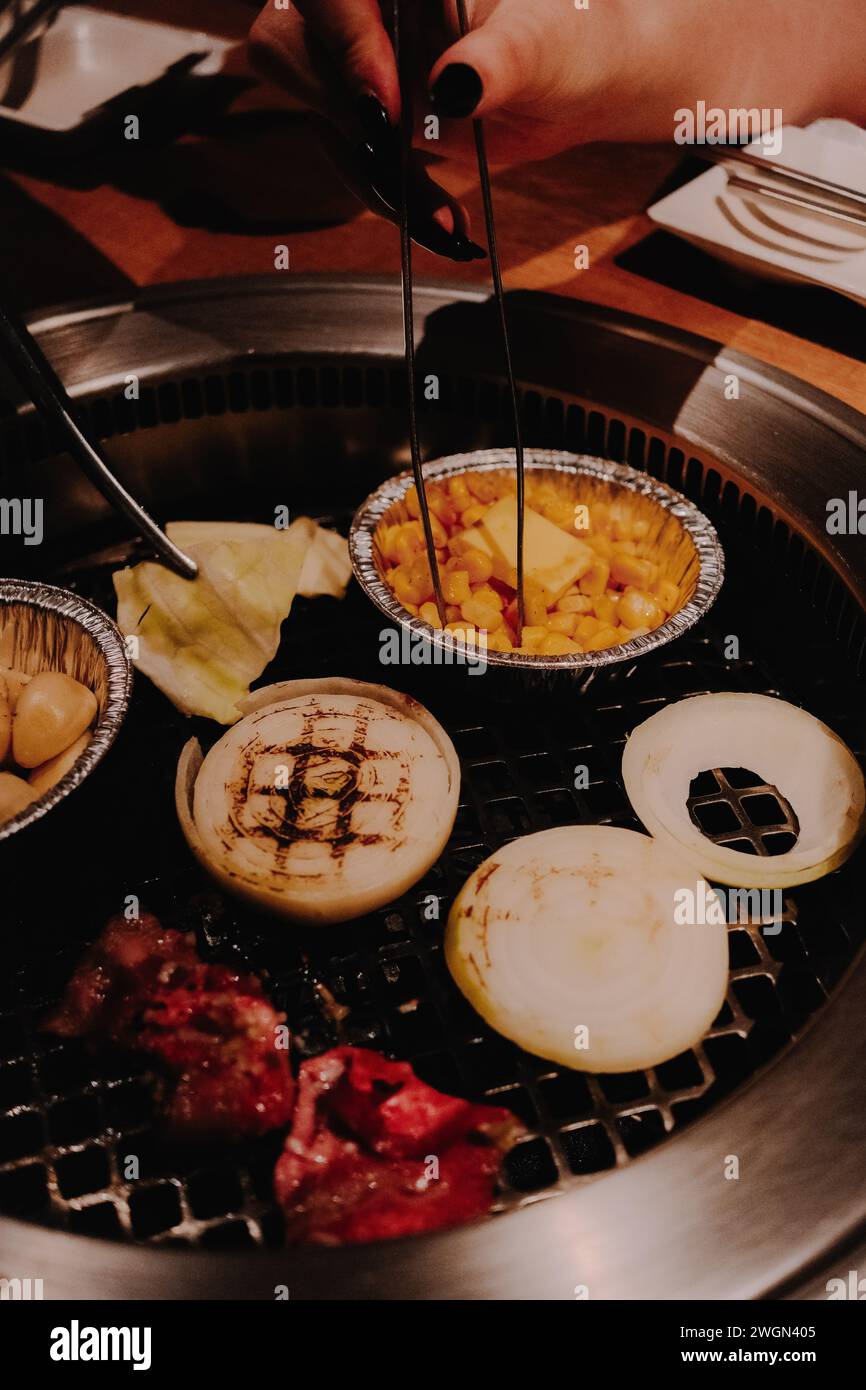 Japanese street food yakiniku, Tokyo, Japan Stock Photo - Alamy