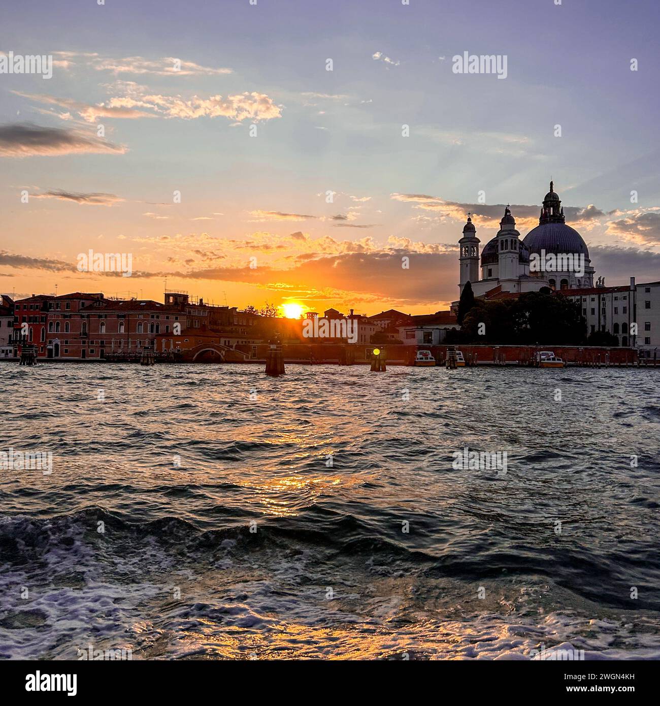 A breathtaking vista unfolds as the sun dips below the horizon, casting ...