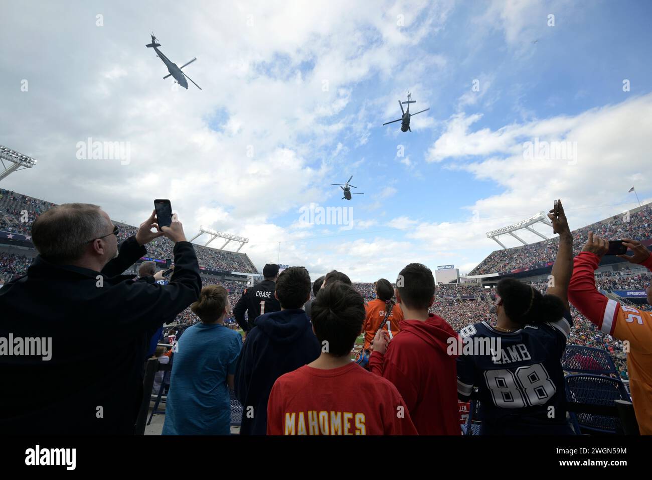 Spectators watch from the stands as U.S. Army Reserves helicopters ...