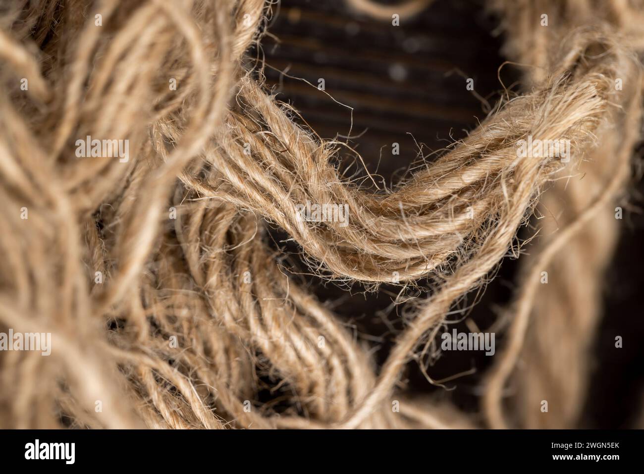 coarse linen rope in close-up, a rope from which you can tie a knot ...