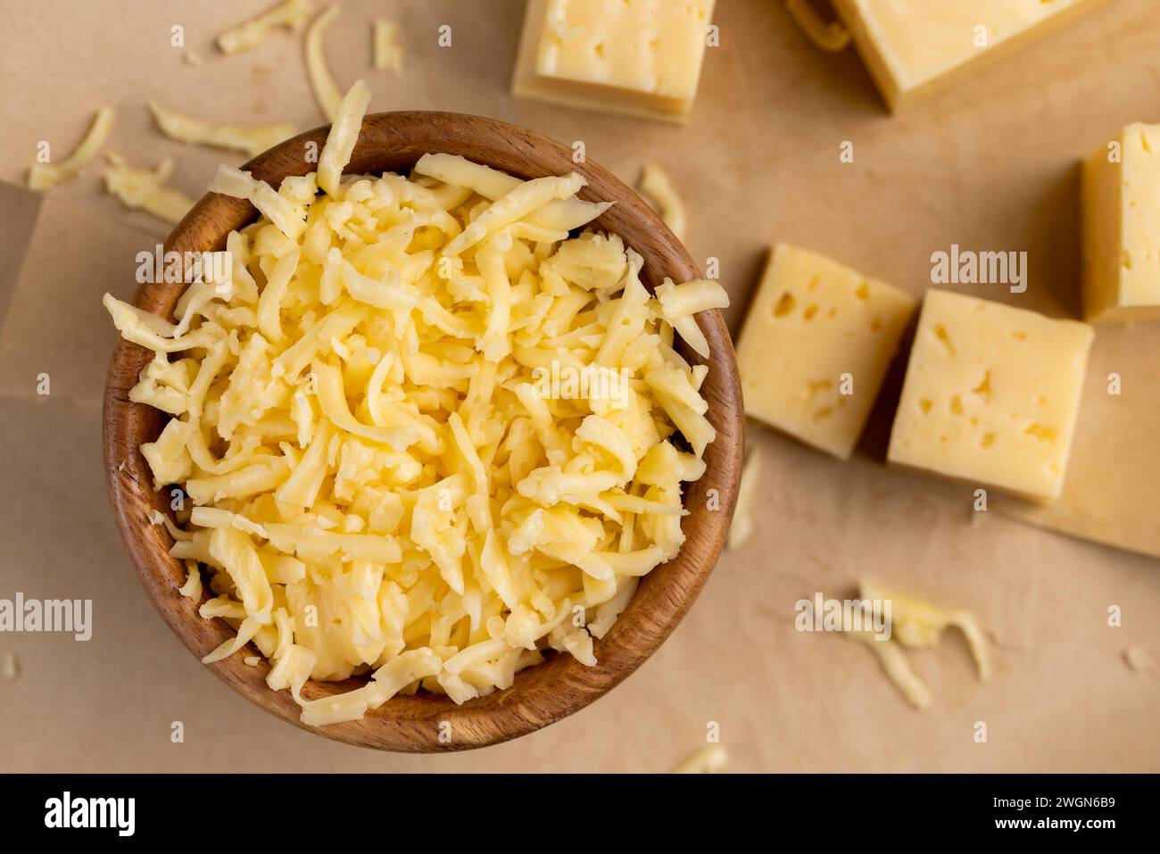 grated yellow semi-hard cheese with holes, fresh cheese from milk ...