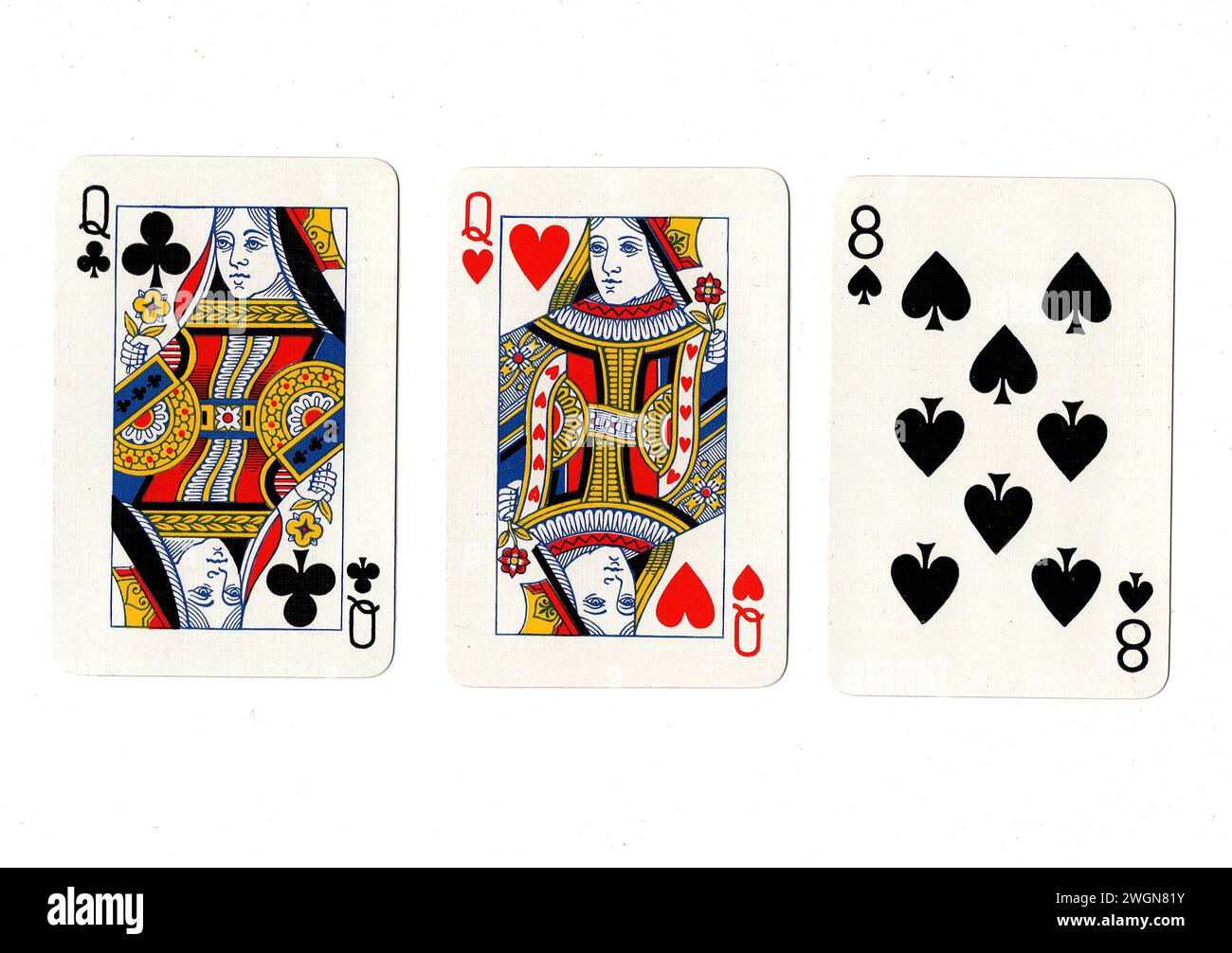 Vintage playing cards showing a pair of queens and a black eight ...
