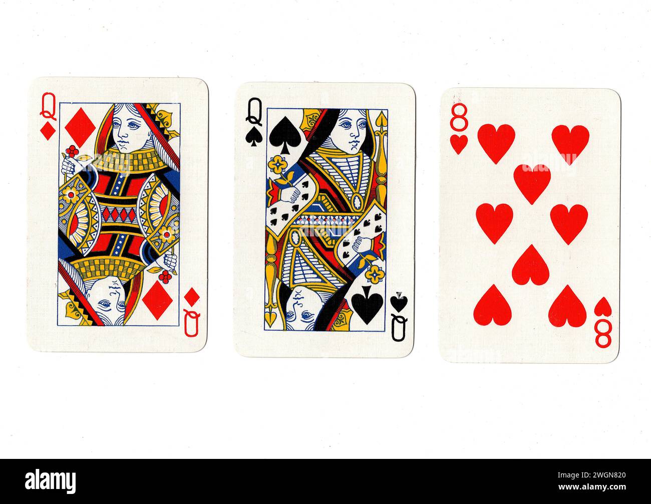 Vintage playing cards showing a pair of queens and a red eight isolated ...