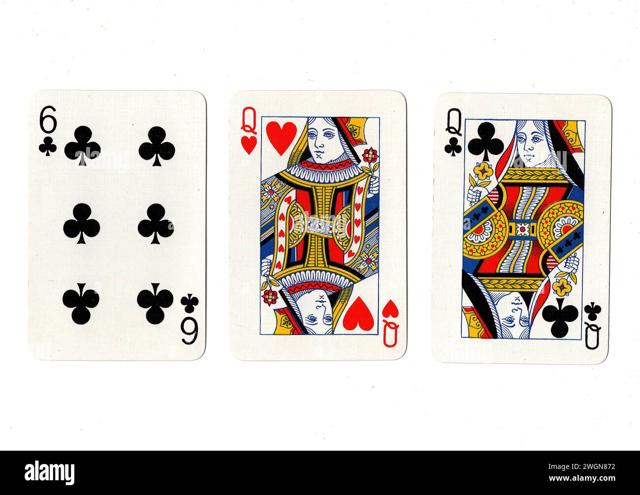 Vintage playing cards showing a pair of queens and a black six isolated ...