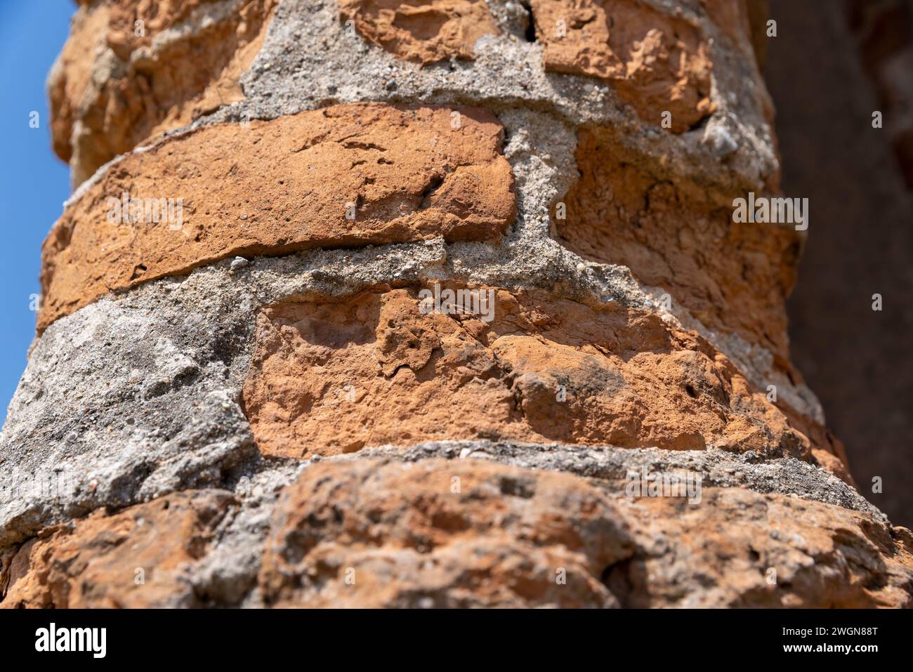 red brick ruins , damaged red bricks from the wall of an ancient ...