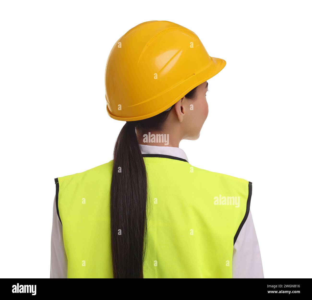 Engineer in hard hat on white background, back view Stock Photo - Alamy