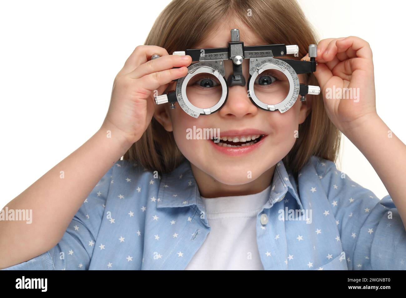 Vision testing. Little girl with trial frame on white background Stock ...