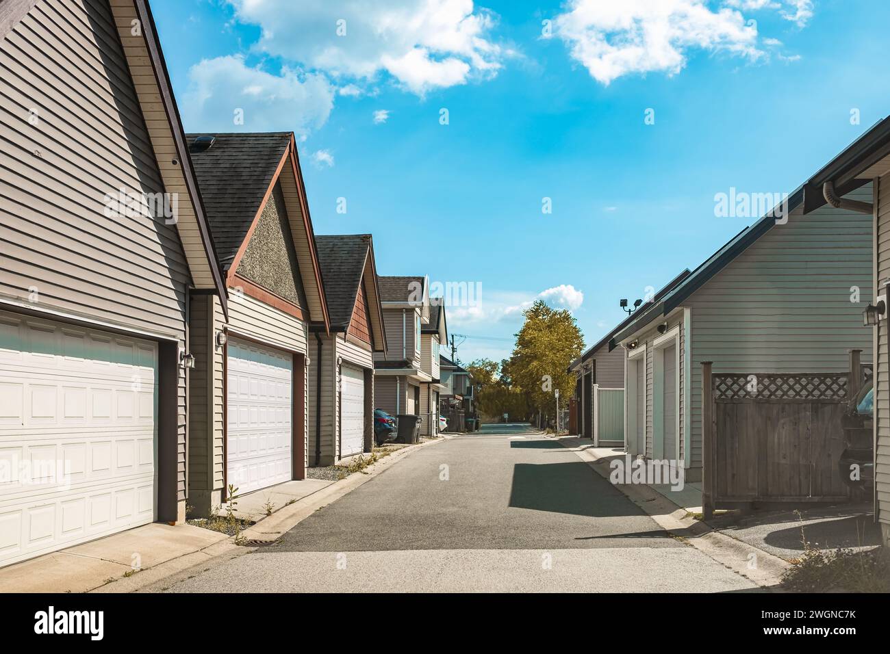 Row of garage doors at parking area for townhouses. Private garages for ...