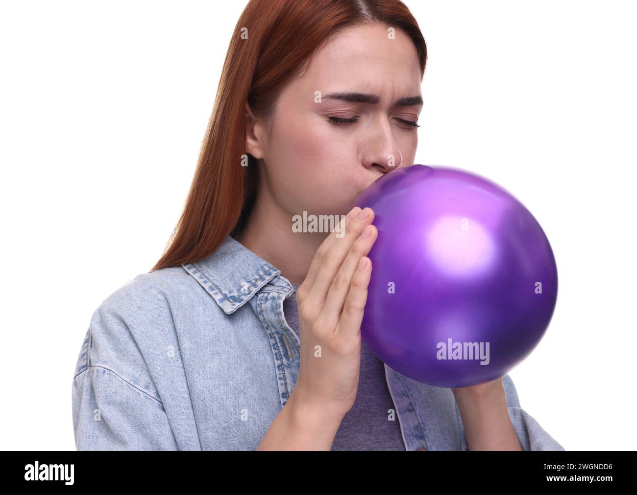 Woman inflating purple balloon on white background Stock Photo - Alamy