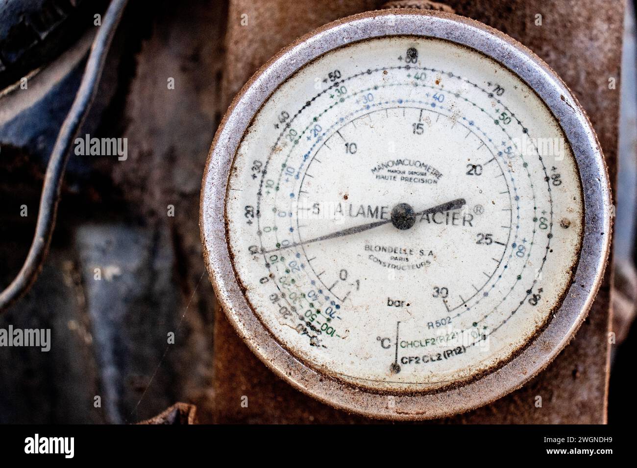 Vintage, old temperature gauge from the Industrial sector machinery ...